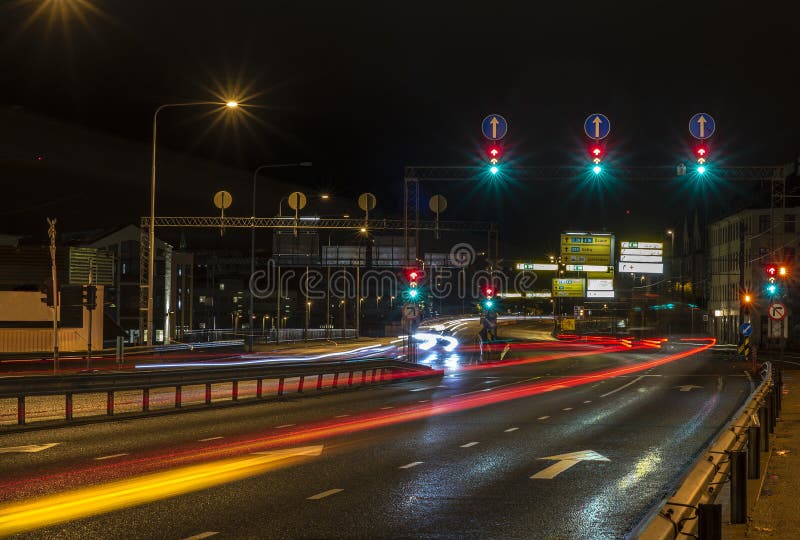 Red and Yellow Light Trails on a Highway Traffic Light Crossing. Stock ...