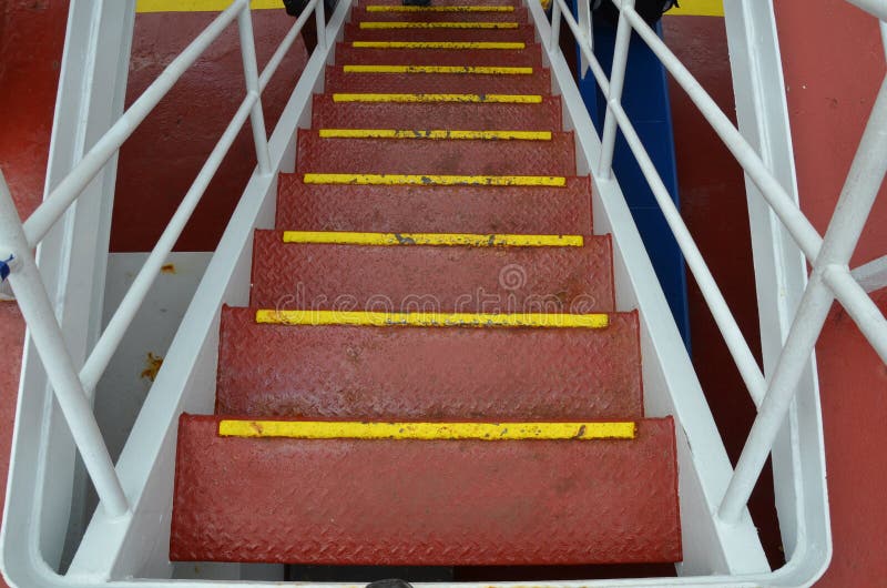 Red and Yellow Metal Steps or Stairs with Railing on Boat Stock Image ...