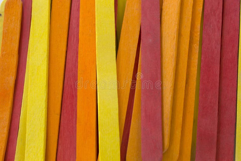 Red,Yellow and Orange Colored Popsicle Sticks Background Stock Photo ...