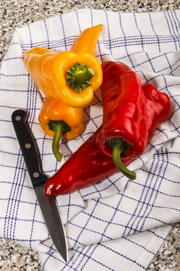 Red and Yellow Paprika on Kitchen Towel Stock Image - Image of paprika ...
