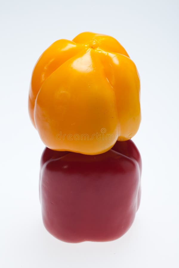 Red and yellow peppers stock image. Image of freshness - 25670215