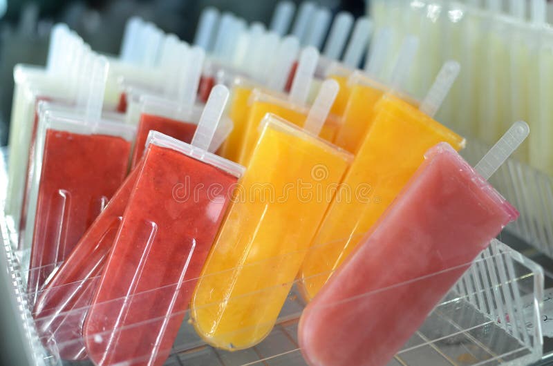 Red and yellow popsicles stock image. Image of refreshing - 51703919