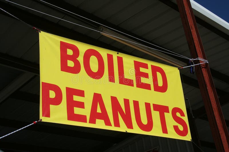 Red and Yellow Sign Advertising Boiled Peanuts Stock Photo - Image of ...