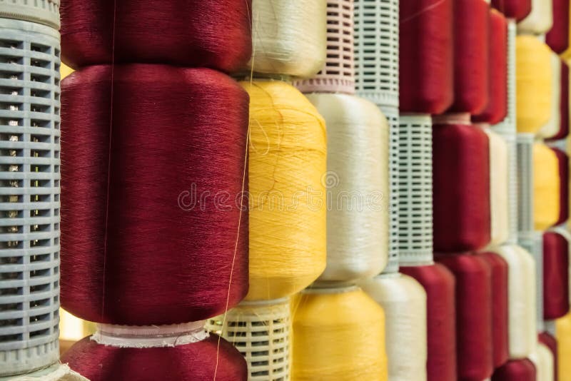 Red and Yellow Silk Thread in Spool Stock Image - Image of spool ...
