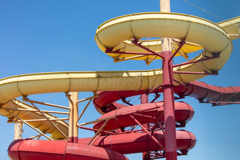 Red and Yellow Slides in the Water Park Stock Photo - Image of park ...