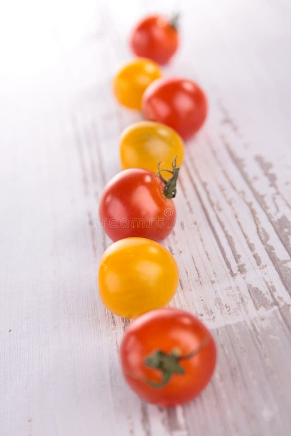 Red and yellow tomatoes stock image. Image of agriculture - 44468047