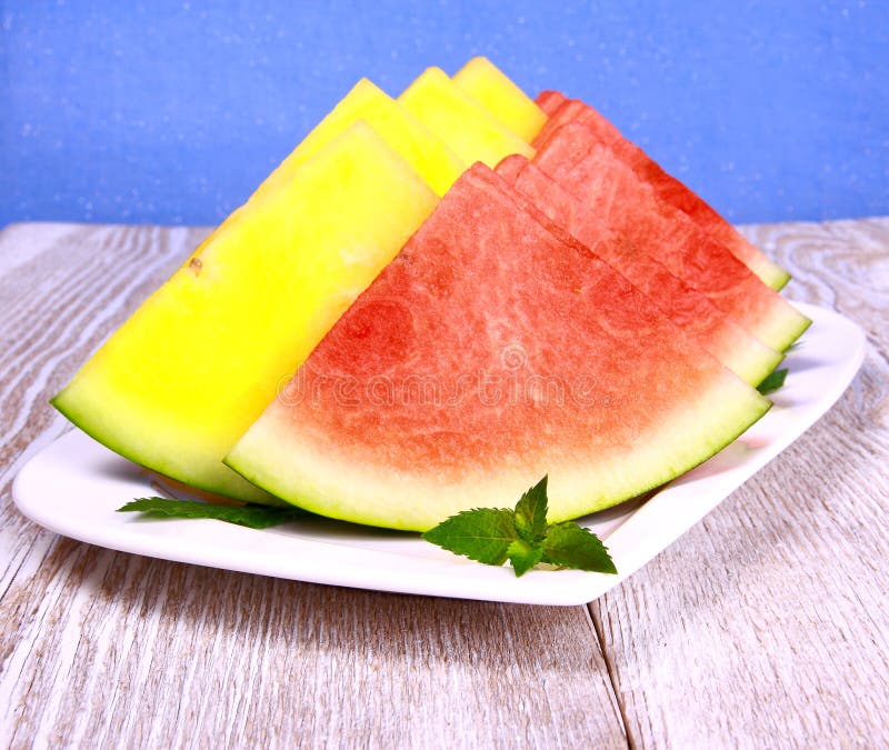 Red and Yellow Watermelon with Mint on White Plate Stock Image - Image ...
