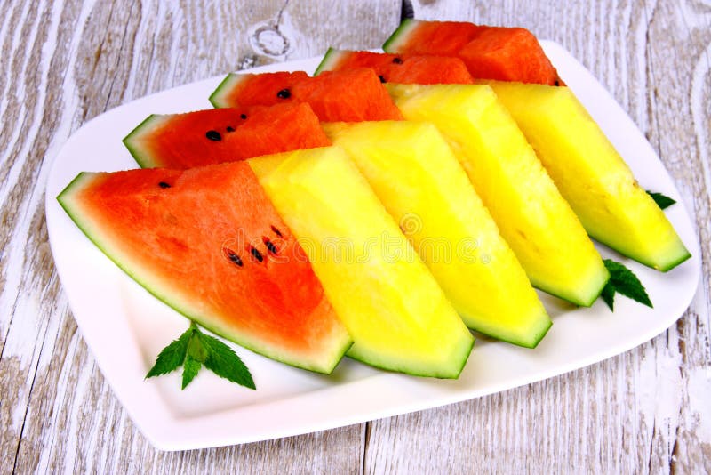 Red and Yellow Watermelon and Mint on White Plate Stock Image - Image ...