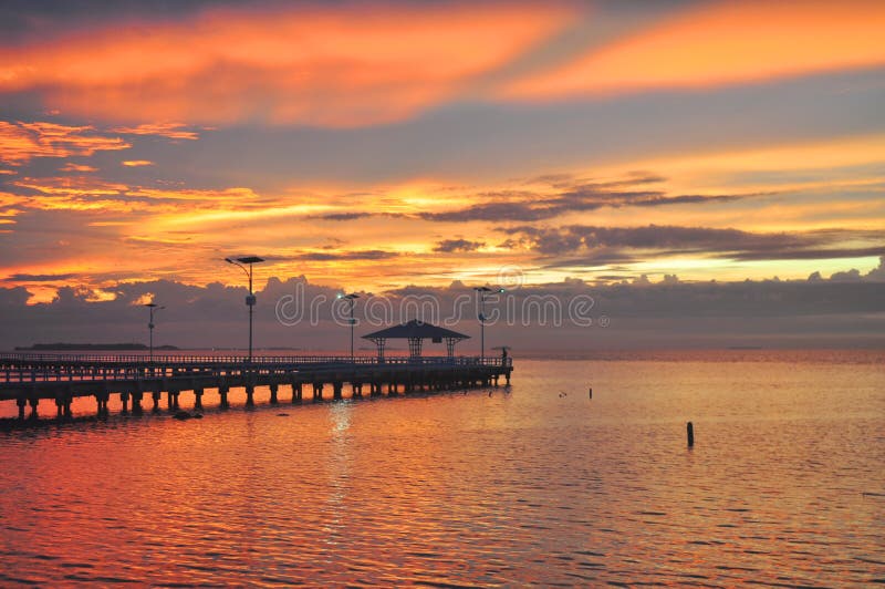 The Reddish Hue of the Sunset on a Bridge on Tidung Island Stock Image ...