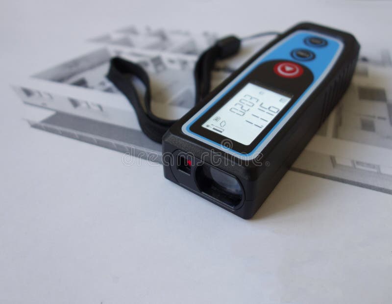 Redevelopment in the Apartment Laser Ruler on the Table with Drawings ...