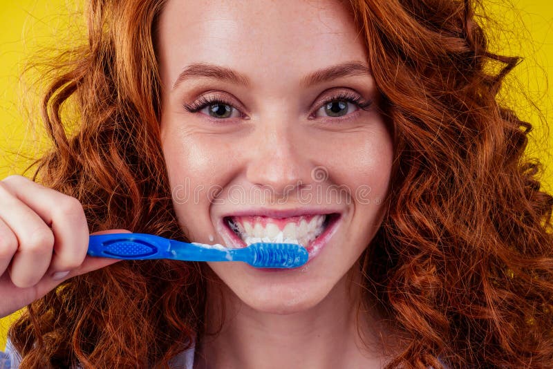 Redhaired Ginger Woman Brushing Teeth with Toothpaste Eco Paste on ...