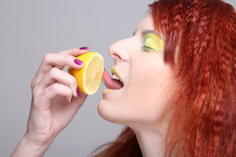 Redhaired Girl Licking the Lemon Stock Image - Image of closeup, food ...