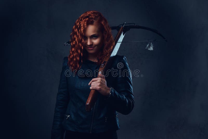 Redhead Female Holds Crossbow. Stock Photo - Image of crossbow ...