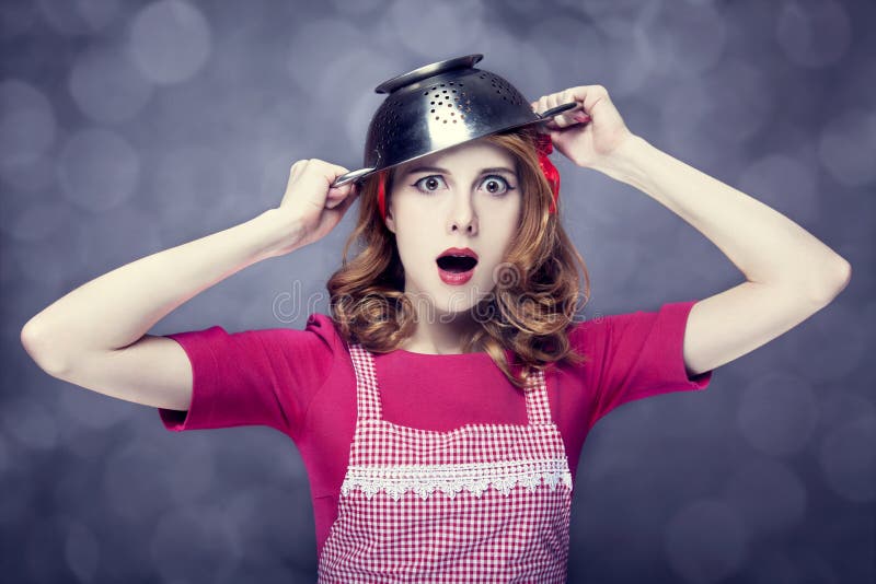 Redhead Housewife with Colander Over Head Stock Image - Image of health ...