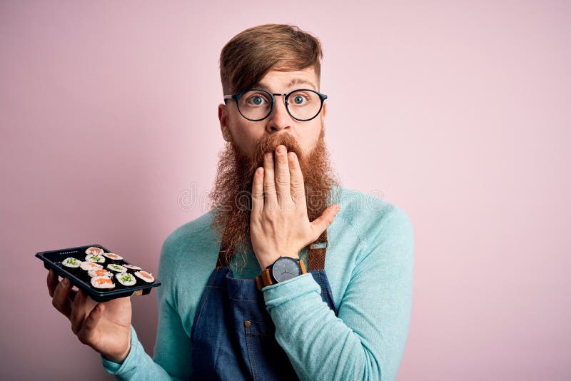 Redhead Irish Cook Man With Beard Holding Maki Sushi Tray Over Isolated