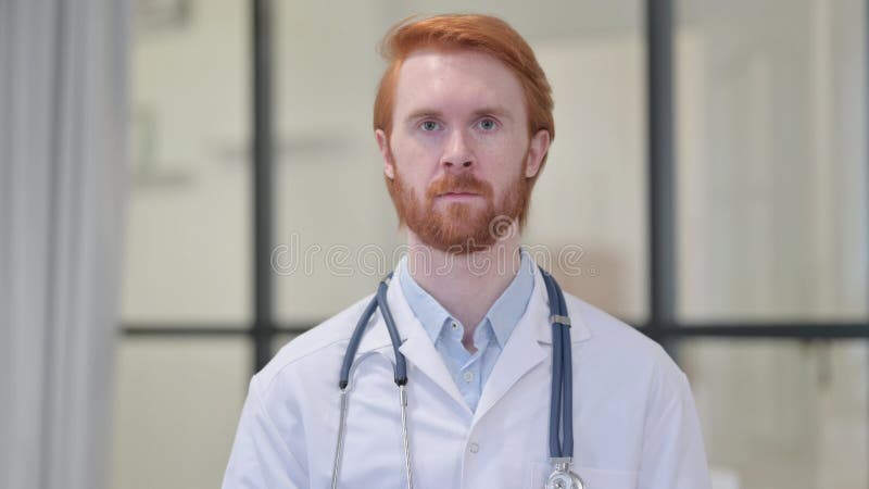 Redhead Male Doctor Looking at Camera Stock Photo - Image of patient ...
