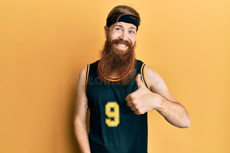 Redhead Man With Long Beard Wearing Basketball Uniform Doing Happy