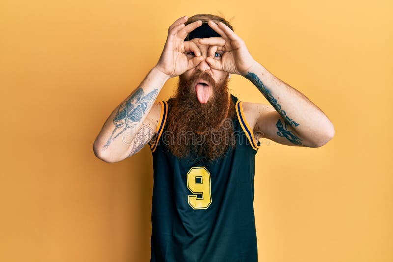 Redhead Man With Long Beard Wearing Basketball Uniform Doing Ok Gesture