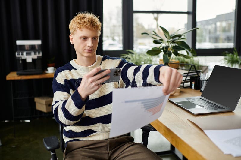 Redhead Manager Reviewing Documents while Using Stock Image - Image of ...