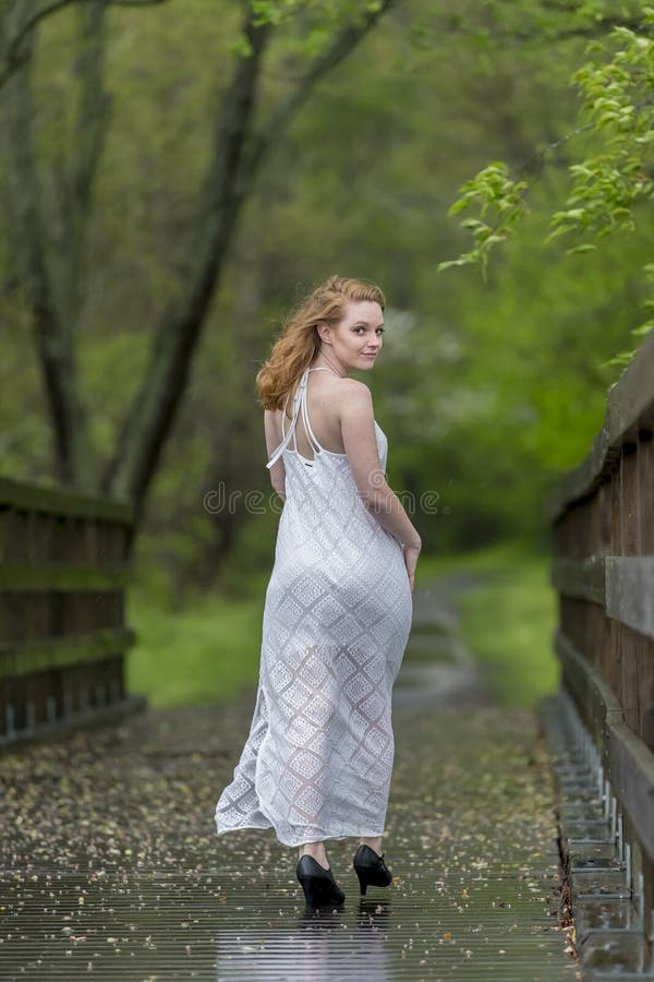 Redhead Model in the Rain stock photo. Image of hairstyle - 97127796