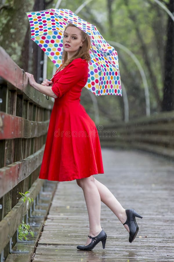 Redhead Model in the Rain stock image. Image of gravel - 97127849