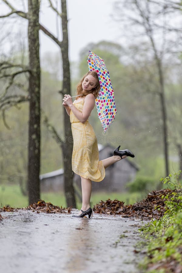 Redhead Model in the Rain stock image. Image of gravel - 97127849