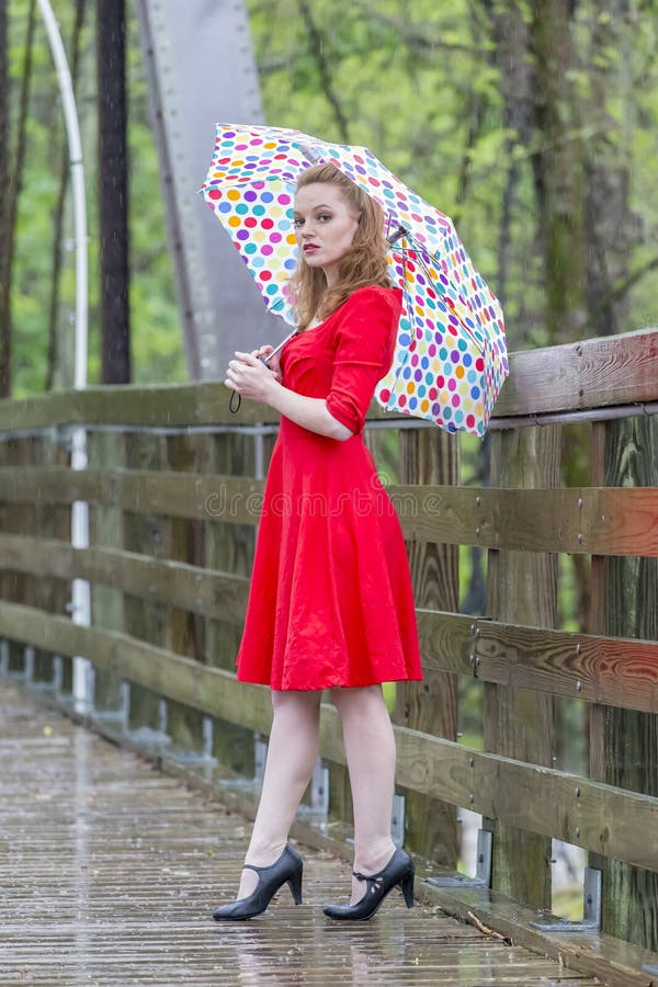 Redhead Model in the Rain stock image. Image of gravel - 97127849