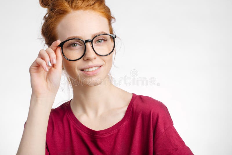 Redhead Smiling Woman Wearing Red Shirt Hold Glasses On White