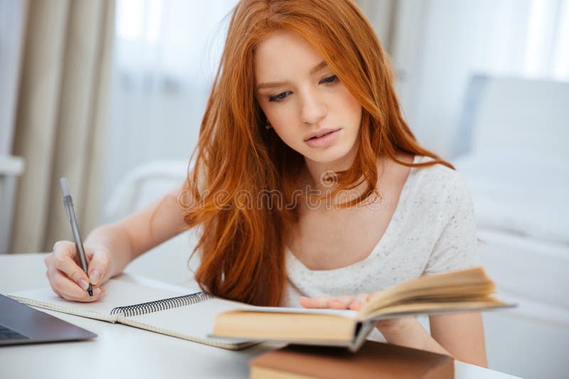 Redhead Woman Doing Homework Stock Photo - Image of modern, portrait ...