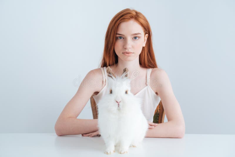 Redhead Woman Sitting Table Rabbit Stock Photos - Free & Royalty-Free ...