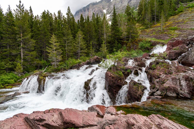 Redrock Falls in Glacier National Park, Along the Swiftcurrent Pass ...