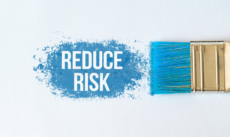 Reduce Risk Text on Blue Paint with Brush on White Background Stock ...