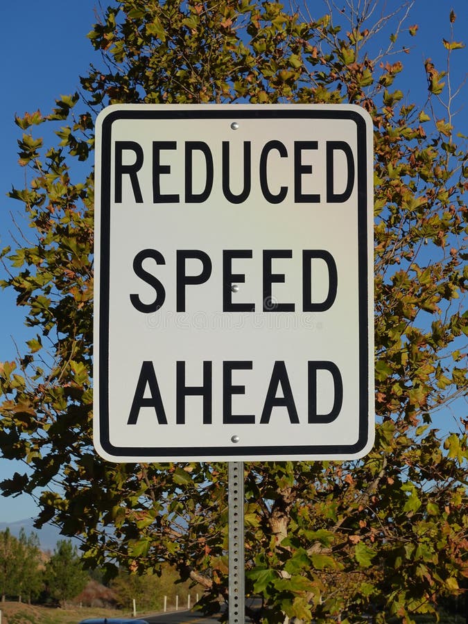 Reduced Speed Ahead Sign on Side of Road Stock Image - Image of ...