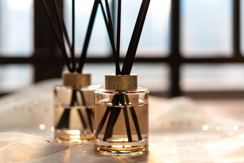 Reed Diffuser in Glass Bottle Placed on Beautiful Gauze Decorated with ...