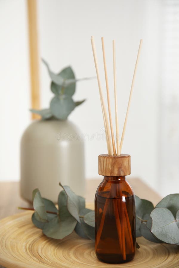 Reed Diffuser and Home Decor on Wooden Tray Indoors Stock Photo - Image ...