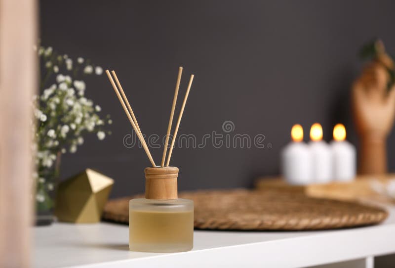 Reed Diffuser on White Table in Bathroom Stock Photo - Image of ...