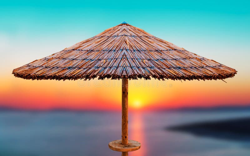 Reed Umbrellas Beach with Blurred Beach Stock Photo - Image of seascape ...
