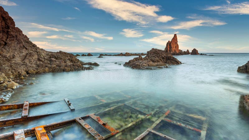 Reef with Rocks and Stairs by the Beach Stock Image - Image of ...