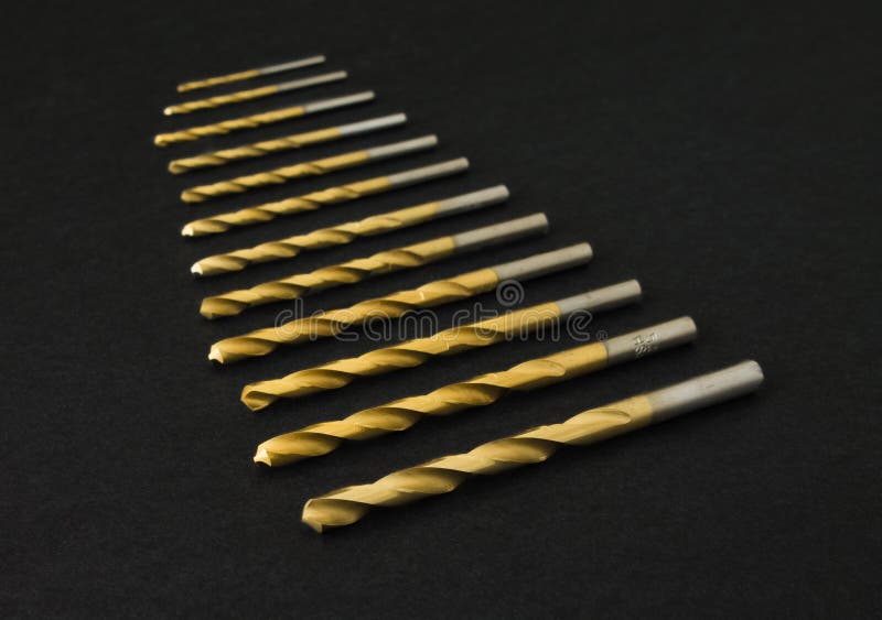 Gouden boorbit stock afbeelding. Image of geïsoleerd - 23991035