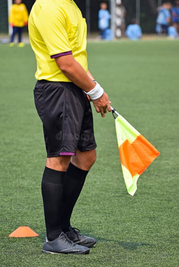 Referee with a flag stock image. Image of referee, shoe - 58503613