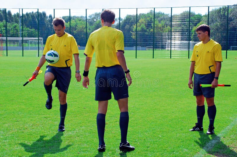 Referees play with ball editorial stock photo. Image of goalkeeper ...