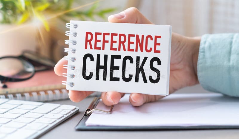 Reference Checks Text on an Open Notebook in Hand, Calculator, Business ...