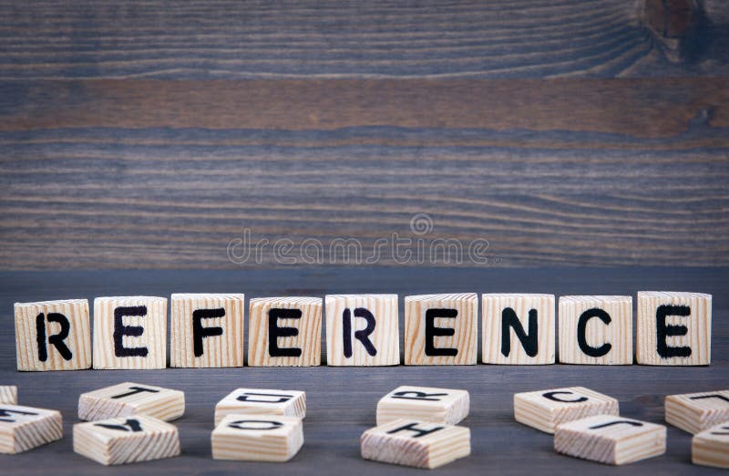 Reference Word Written on Wood Block. Wooden Alphabet on a Blue ...