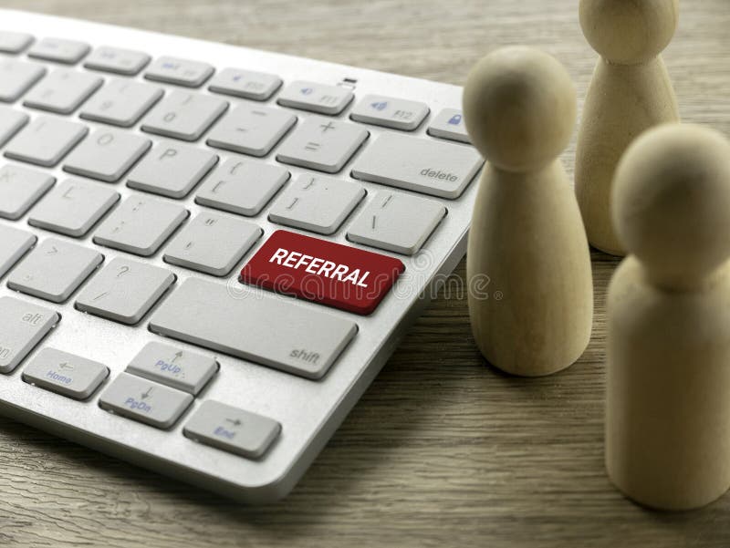 Referral Button Keyboard with Wooden People Figures Stock Image - Image ...
