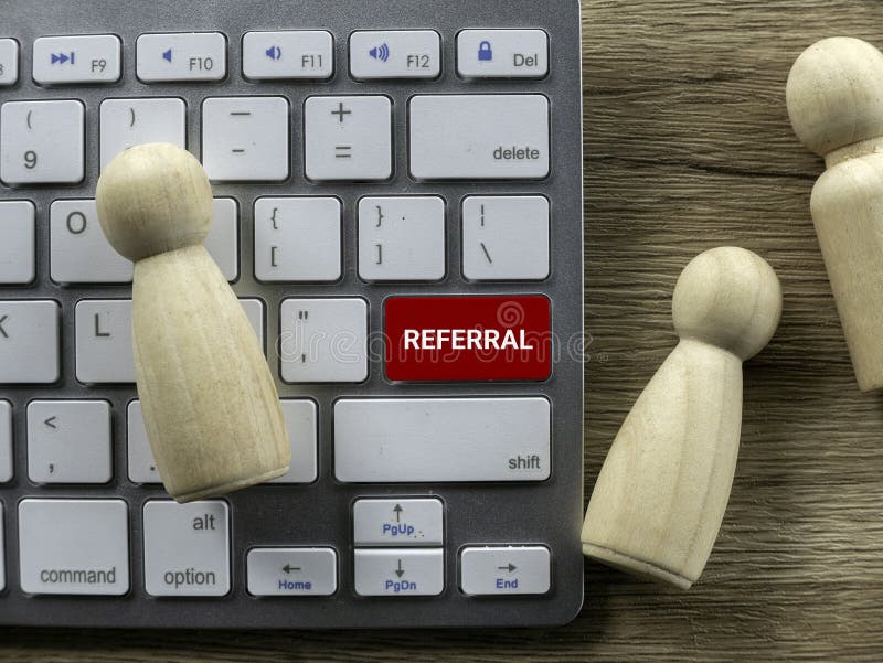 Referral Button Keyboard with Wooden People Figures Stock Photo - Image ...