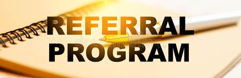 Referral Program on the Background of a Pen and Notebook before Work in ...