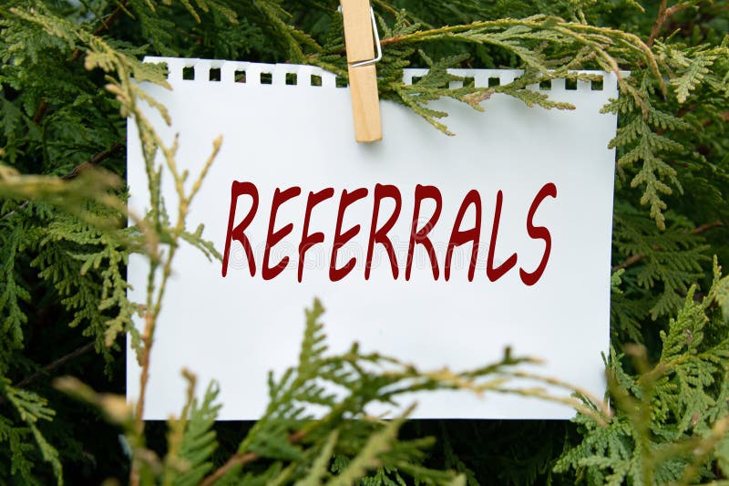 REFERRALS - Word on White Paper with Clothespin on a Green Background ...