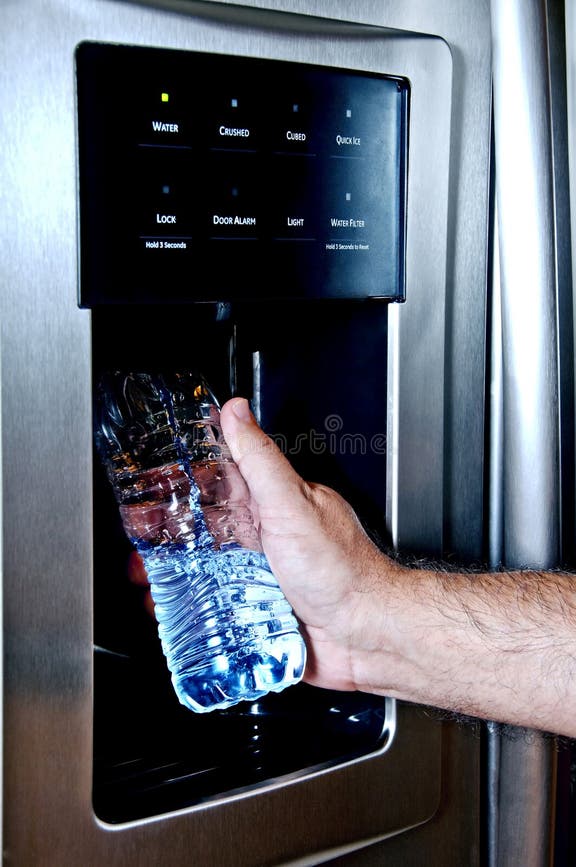 Refilling Plastic Bottles from a Water Dispenser. Stock Photo - Image ...