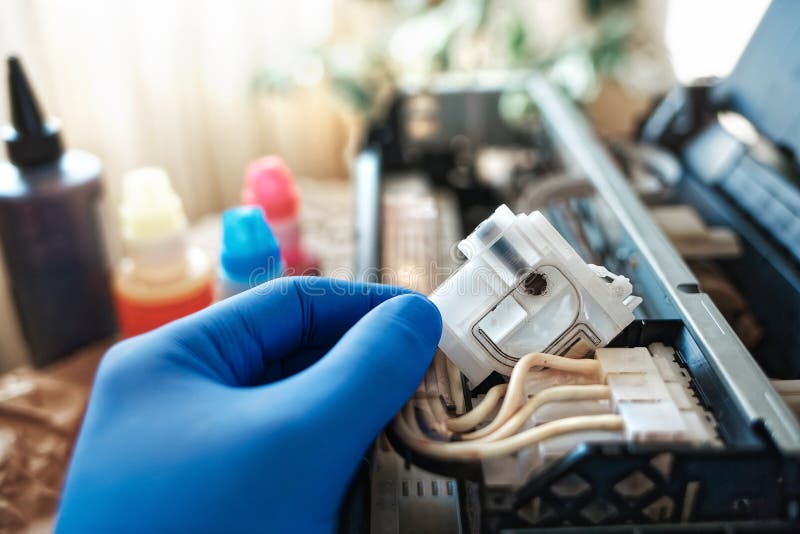 Refilling the Printer with Ink. Service and Maintenance of Equipment at ...