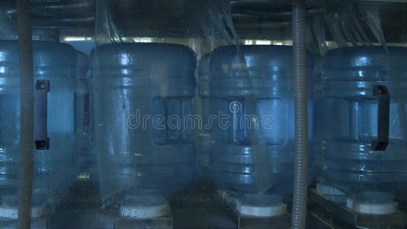 Refilling Process of Water Cooler Bottles Stock Footage - Video of ...